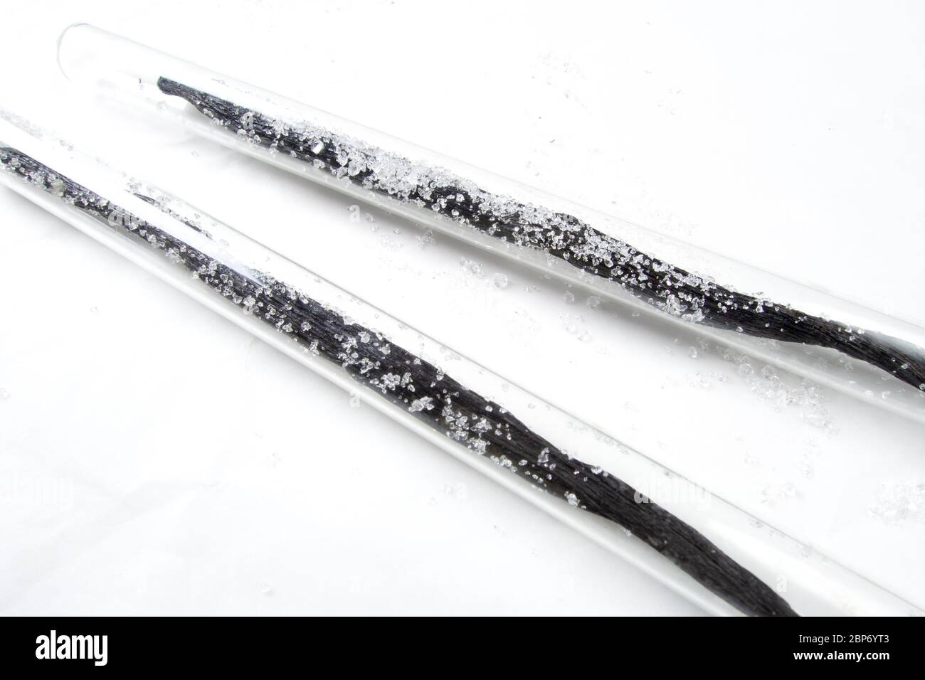 Sweet natural vanilla sticks with sugar crystals Stock Photo - Alamy