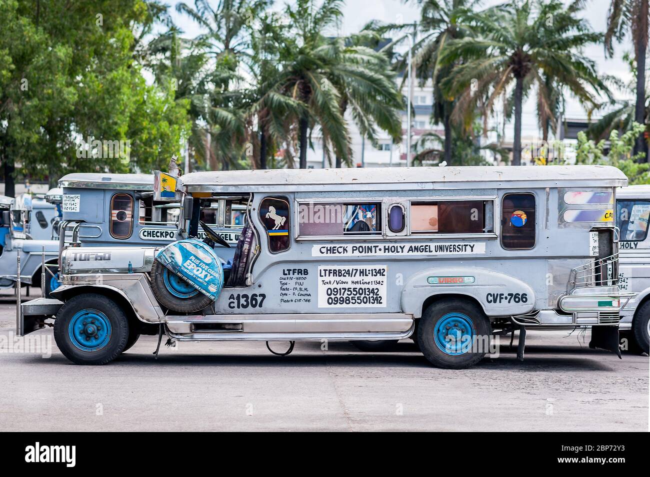 Classic jeepneys sat at the Main Gate bus terminal in Angeles City ...