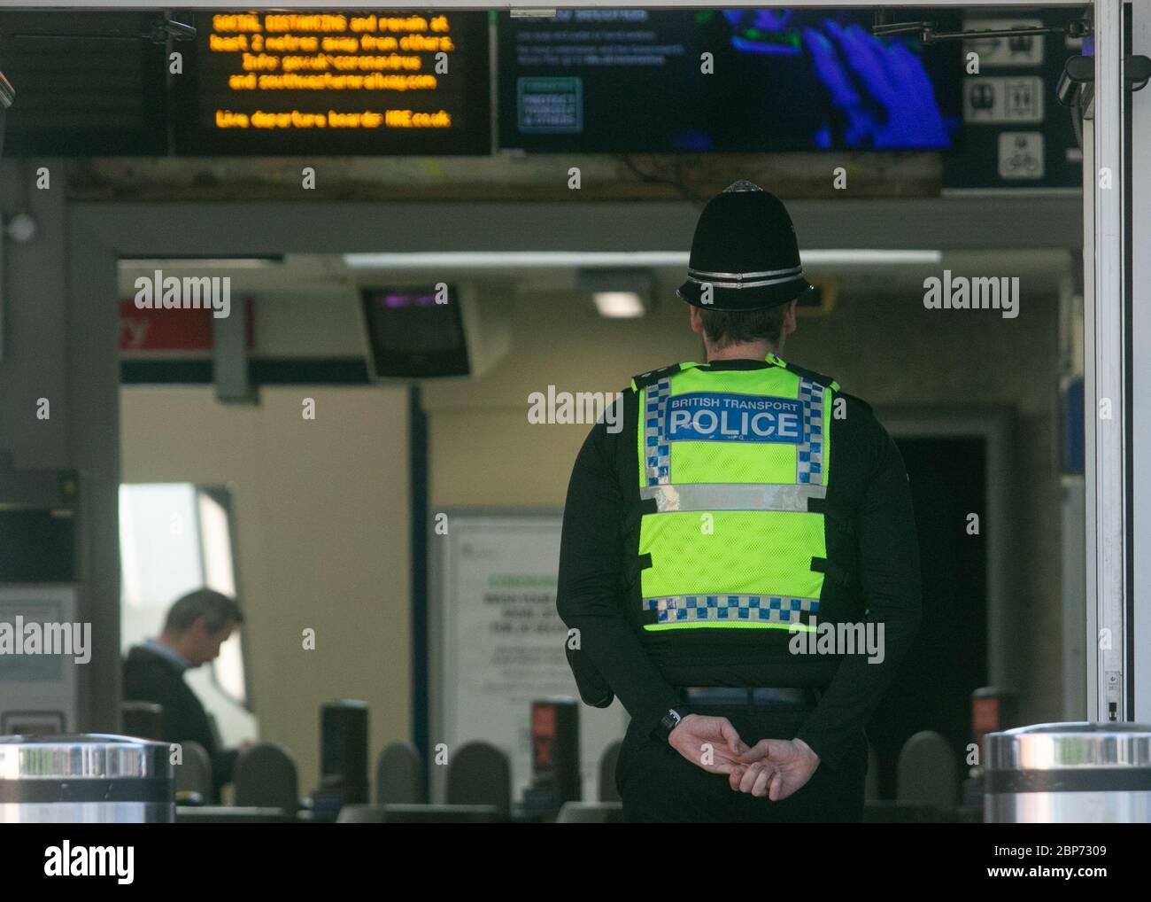 WIMBLEDON LONDON, 18 May 2020. UK. A British Transport police officer ...
