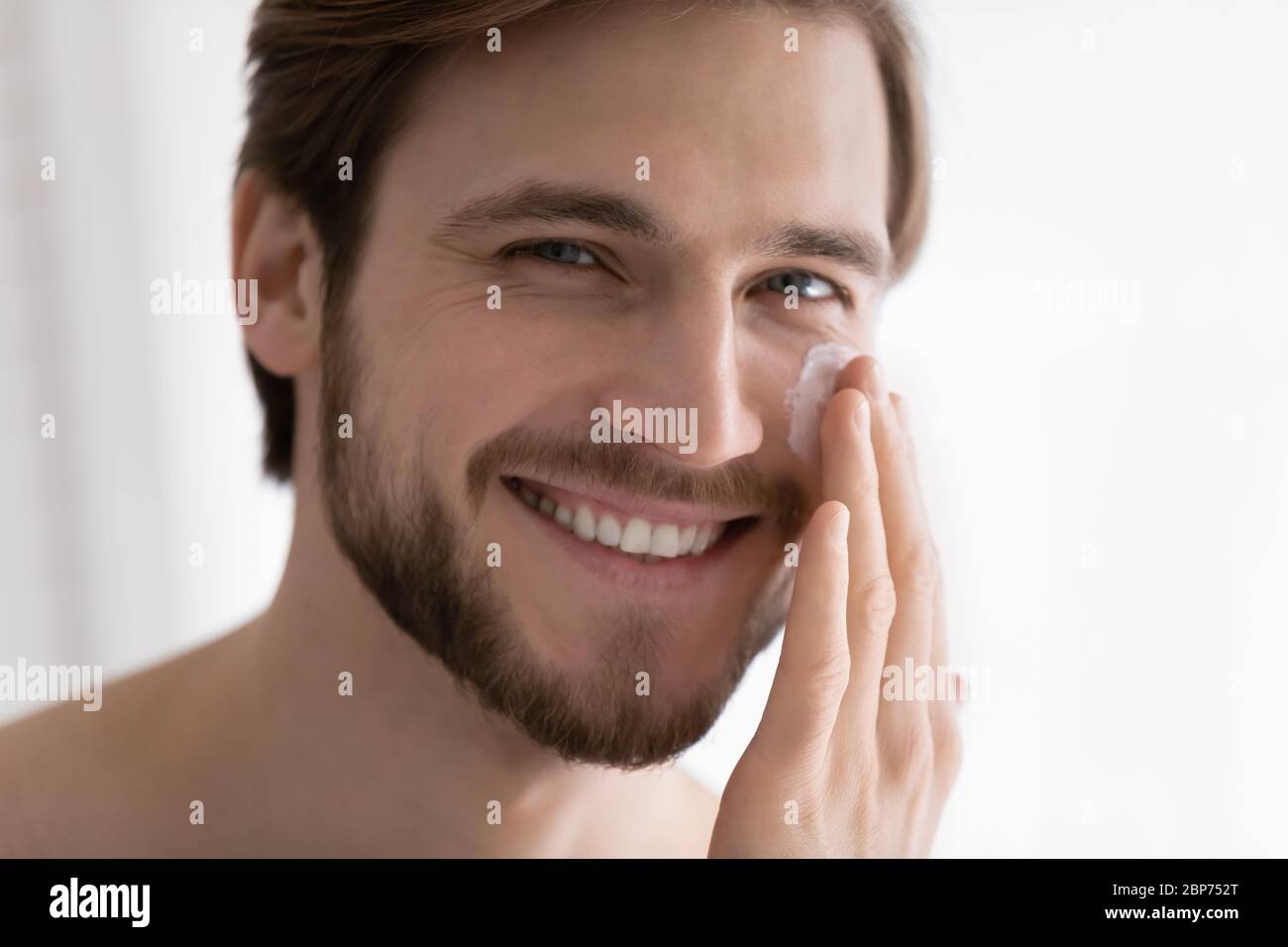 Portrait skincare serum man hi-res stock photography and images - Alamy