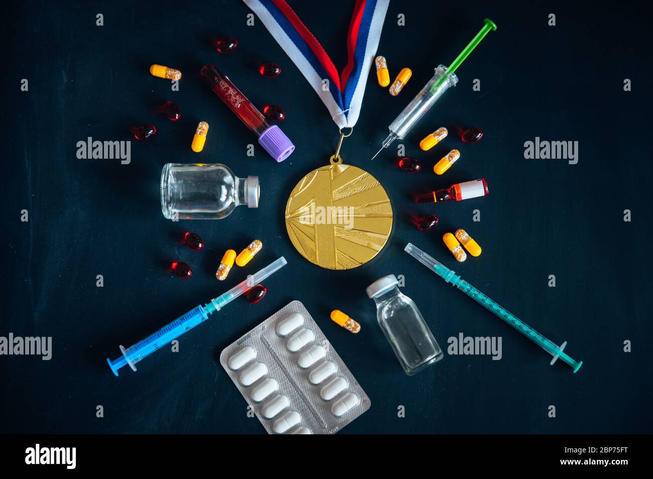 Doping in sport, concept photo. Gold medal, drugs, Medicine bottle for ...