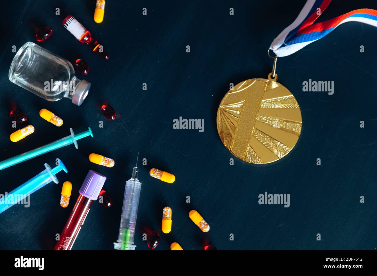 Gold medal and drugs, syringe and Medicine bottle for injection. Doping ...