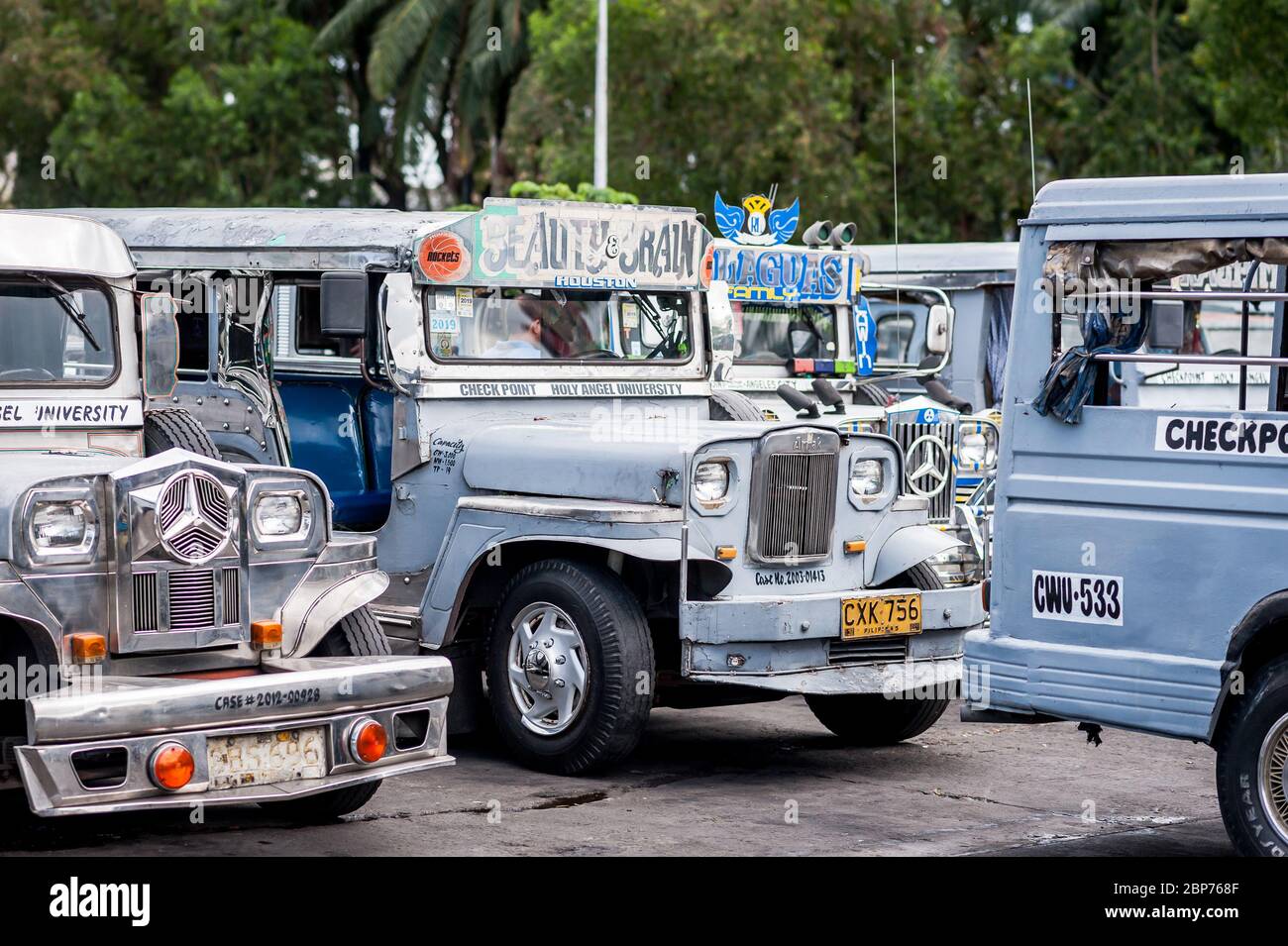 Classic jeepneys sat at the Main Gate bus terminal in Angeles City ...