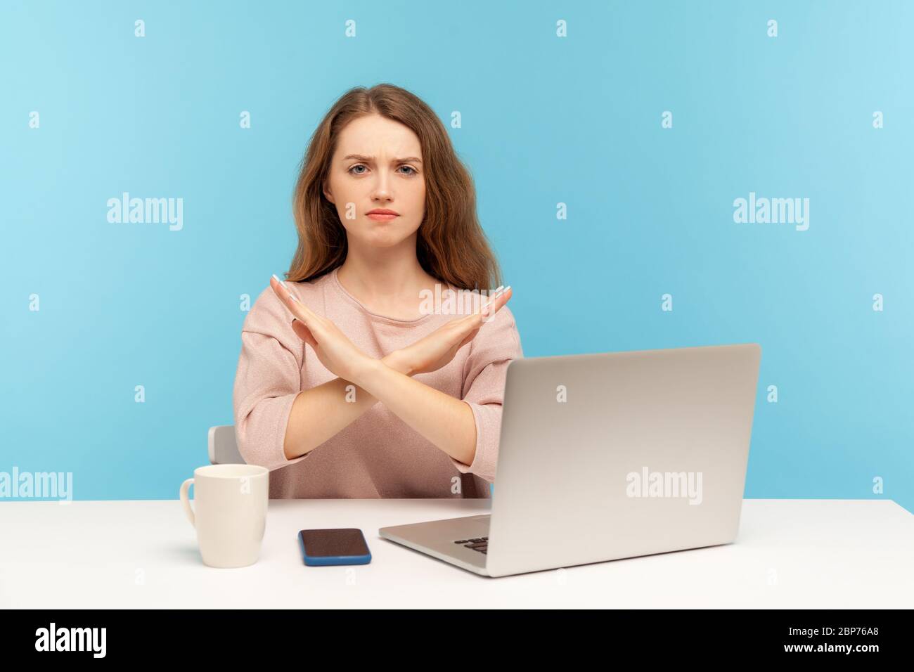 Ban, no access! Angry bossy strict businesswoman sitting at workplace ...