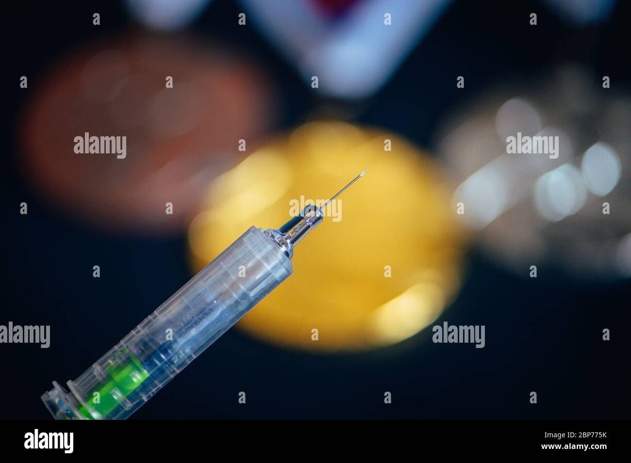 Syringe and medal set in background. Doping and drugs in sport, concept ...