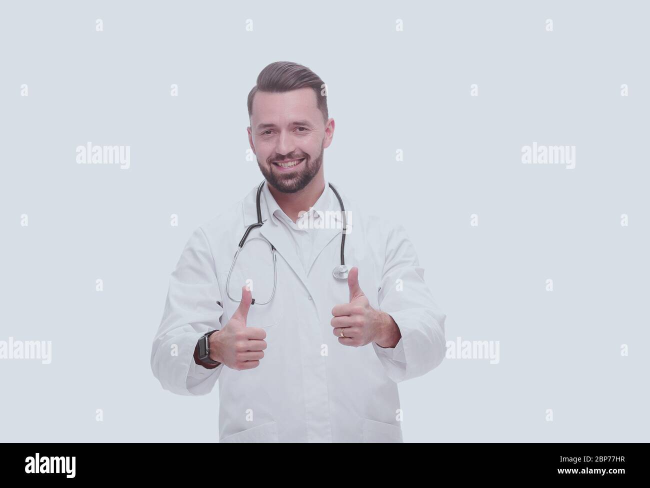 smiling medical professional showing thumbs up .isolated on white Stock ...