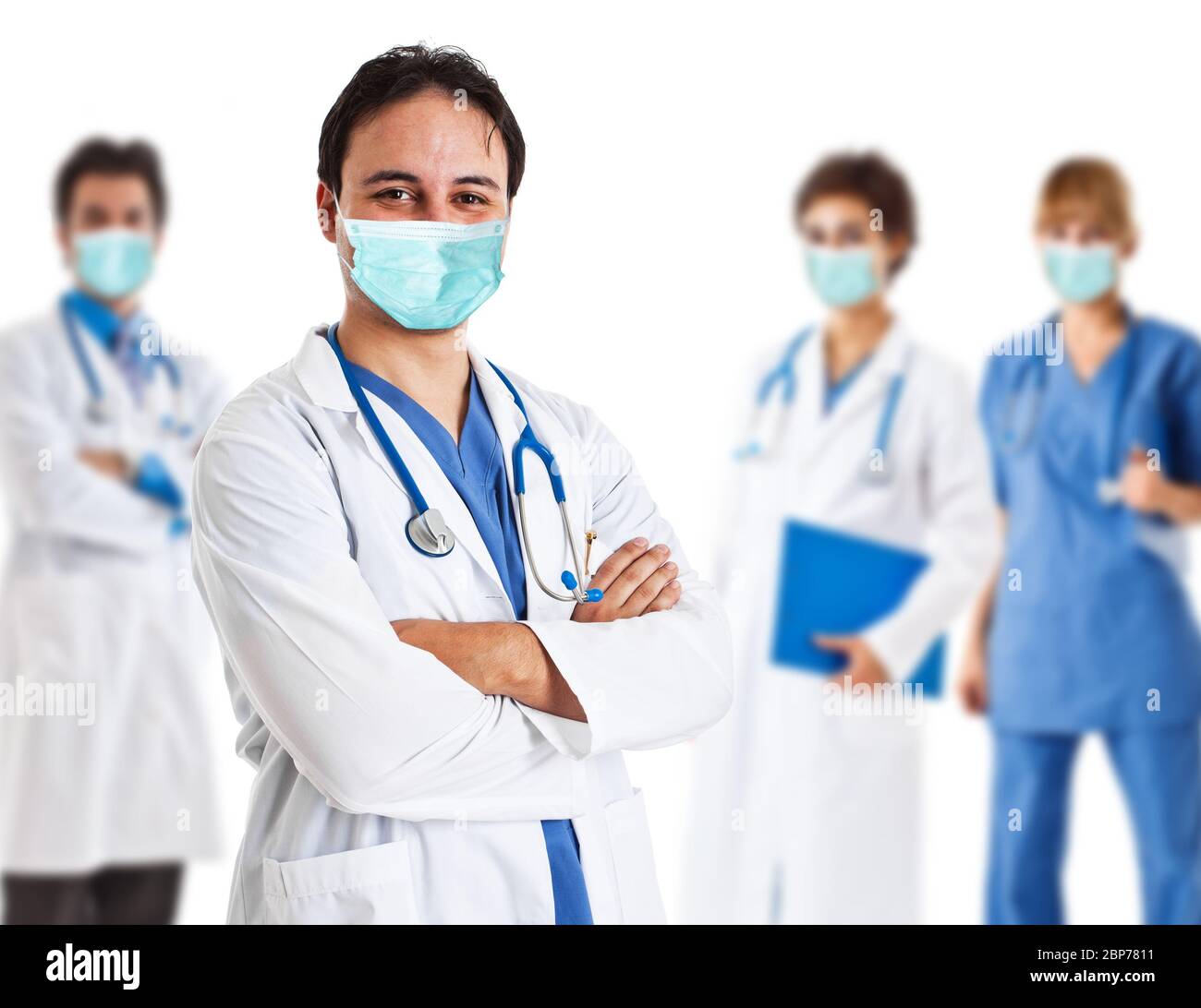 Group of masked doctors during coronavirus pandemic Stock Photo - Alamy