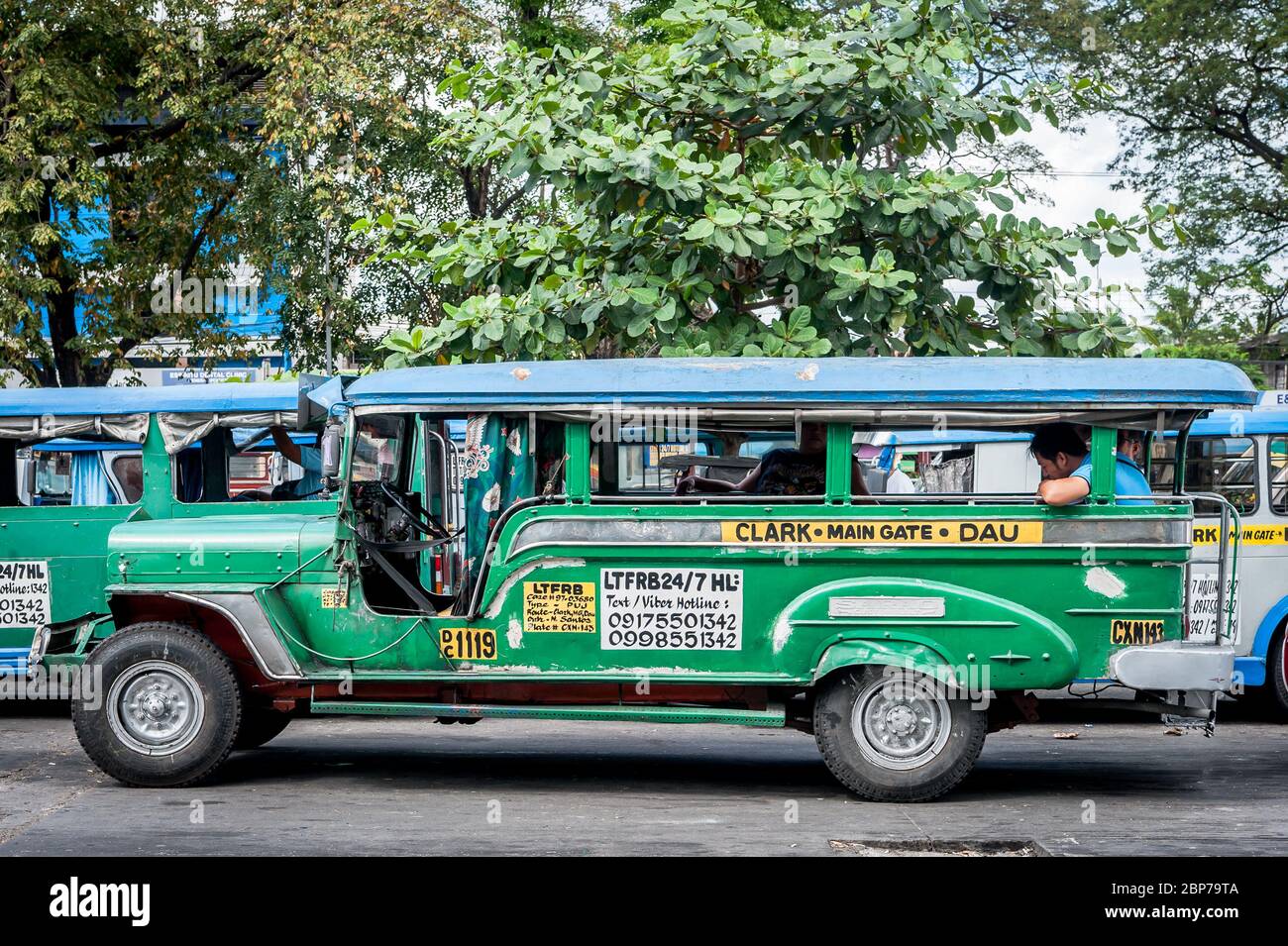 Classic jeepneys sat at the Main Gate bus terminal in Angeles City ...