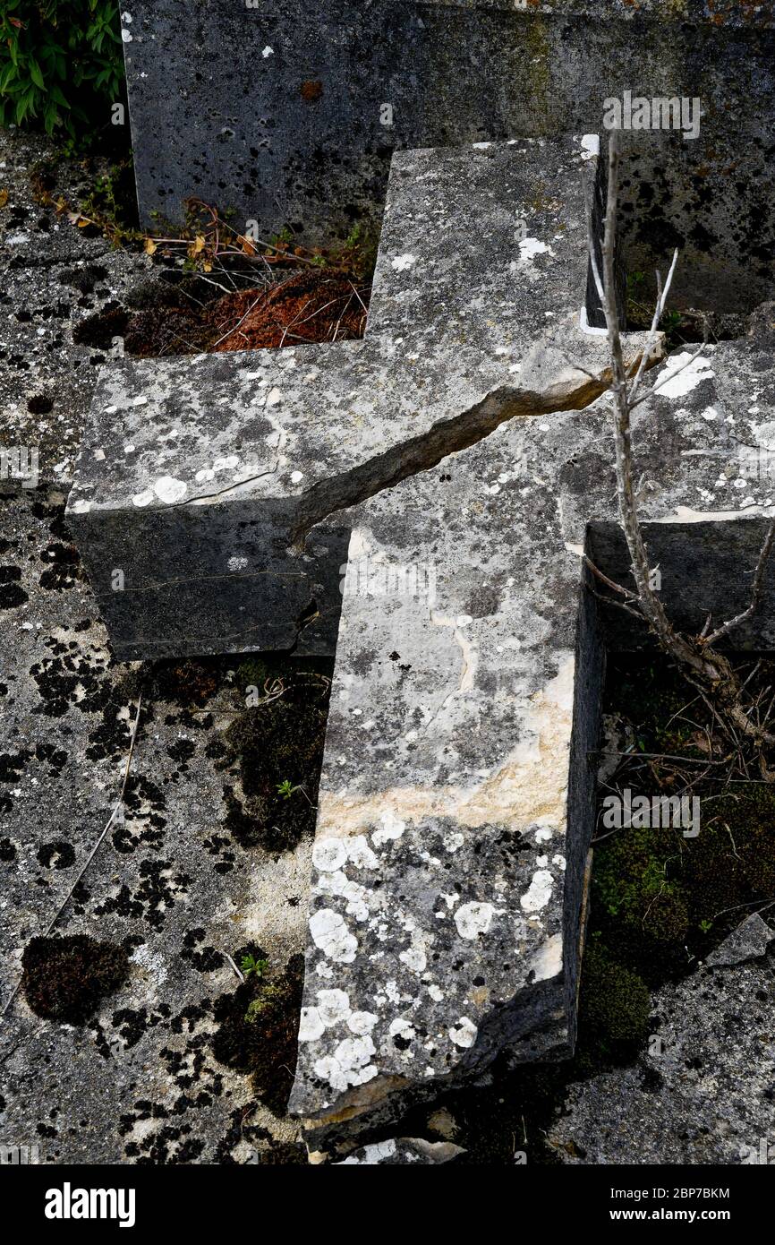 Broken cross on a tombstone, Cemetery of Inimond, Bugey massif, Ain, France Stock Photo - Alamy