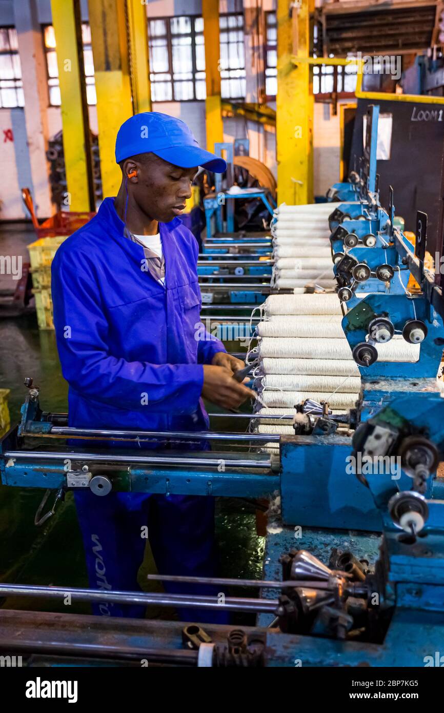 Johannesburg, South Africa - October 16, 2012: African factory worker ...