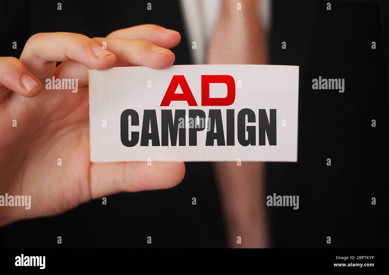 Ad Campaign on a card businessman shows. Advertising and marketing ...