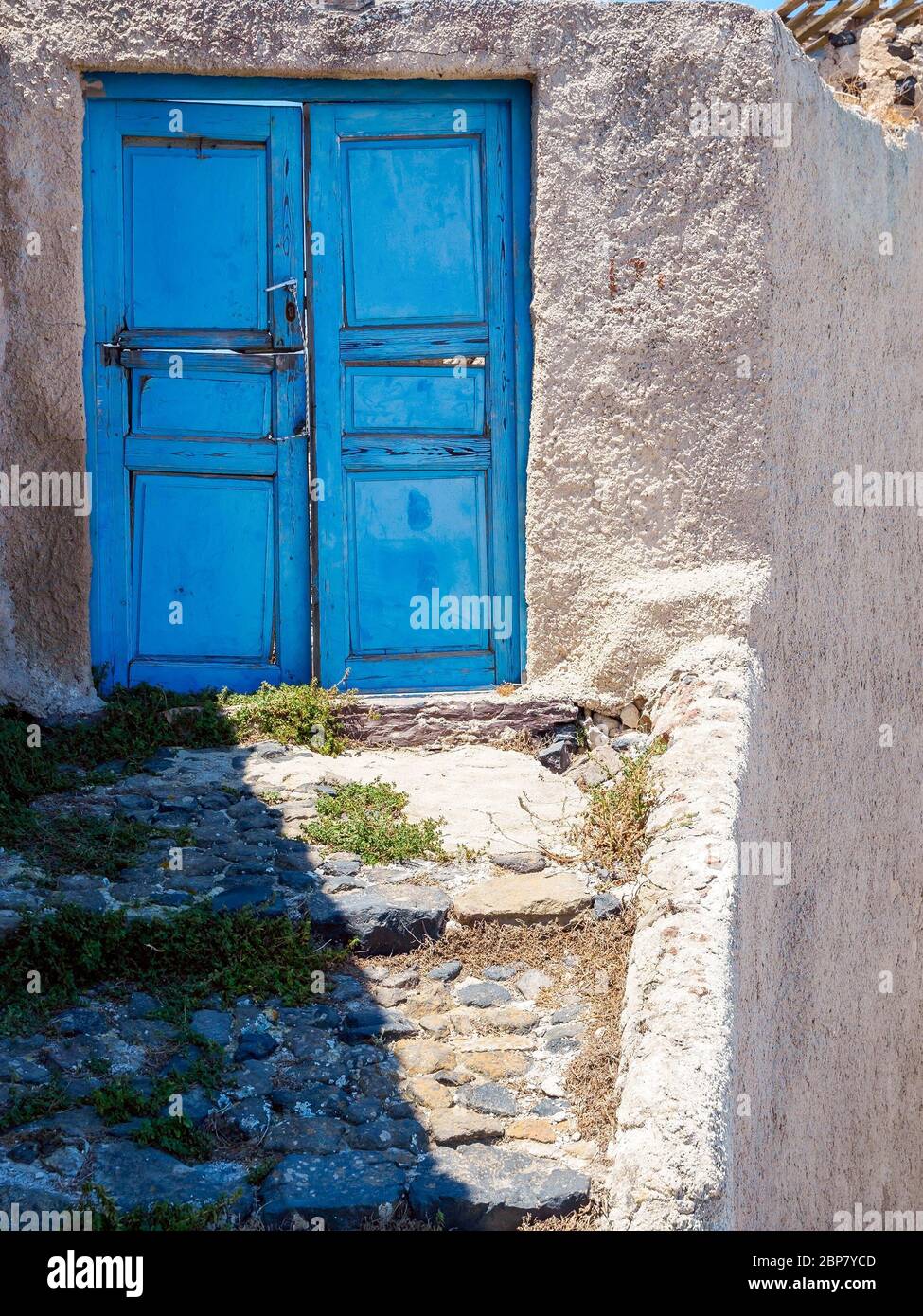 Old beautiful wooden door on Santorini island. Cyclades, Greece. Close ...