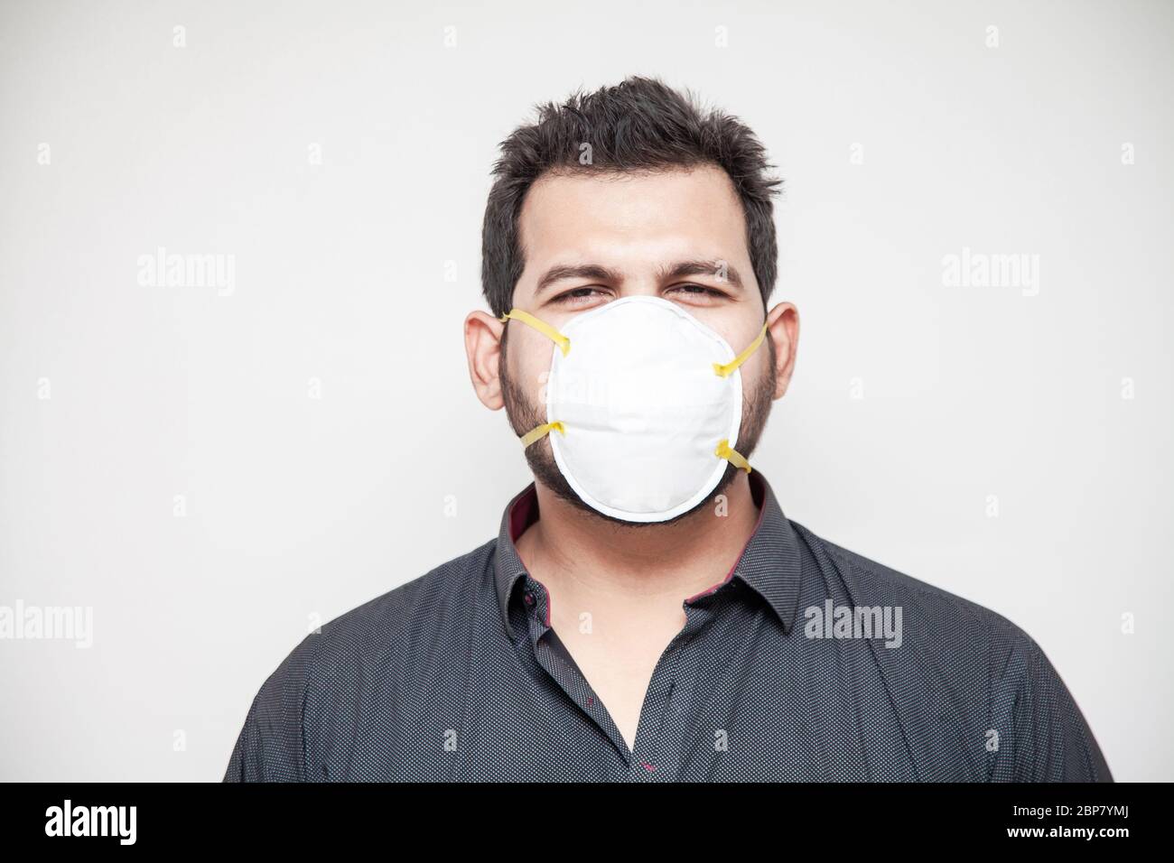 Man covering his face with covid-19 mask, safe working environment ...