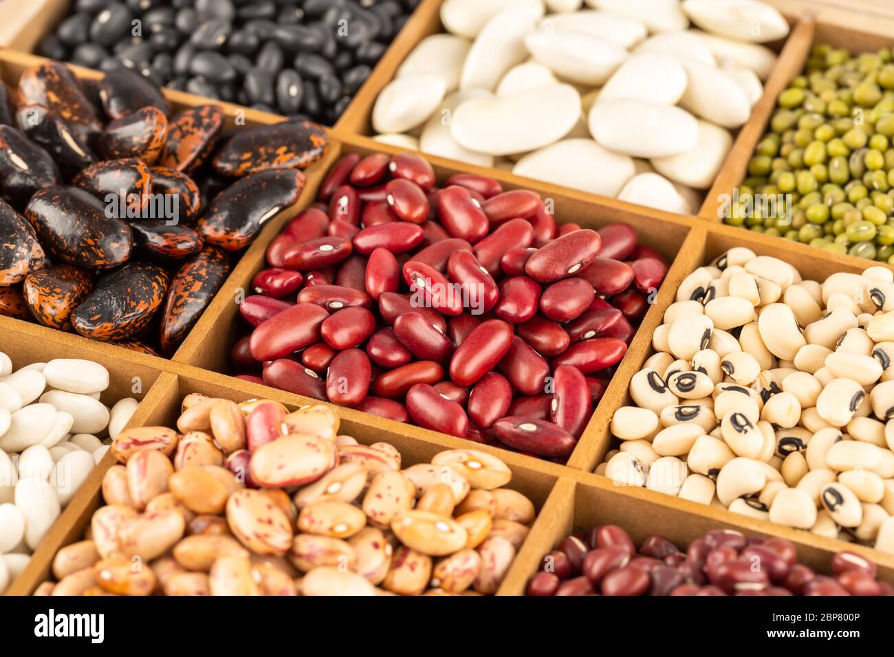 The collection of different beans in the wooden box Stock Photo - Alamy