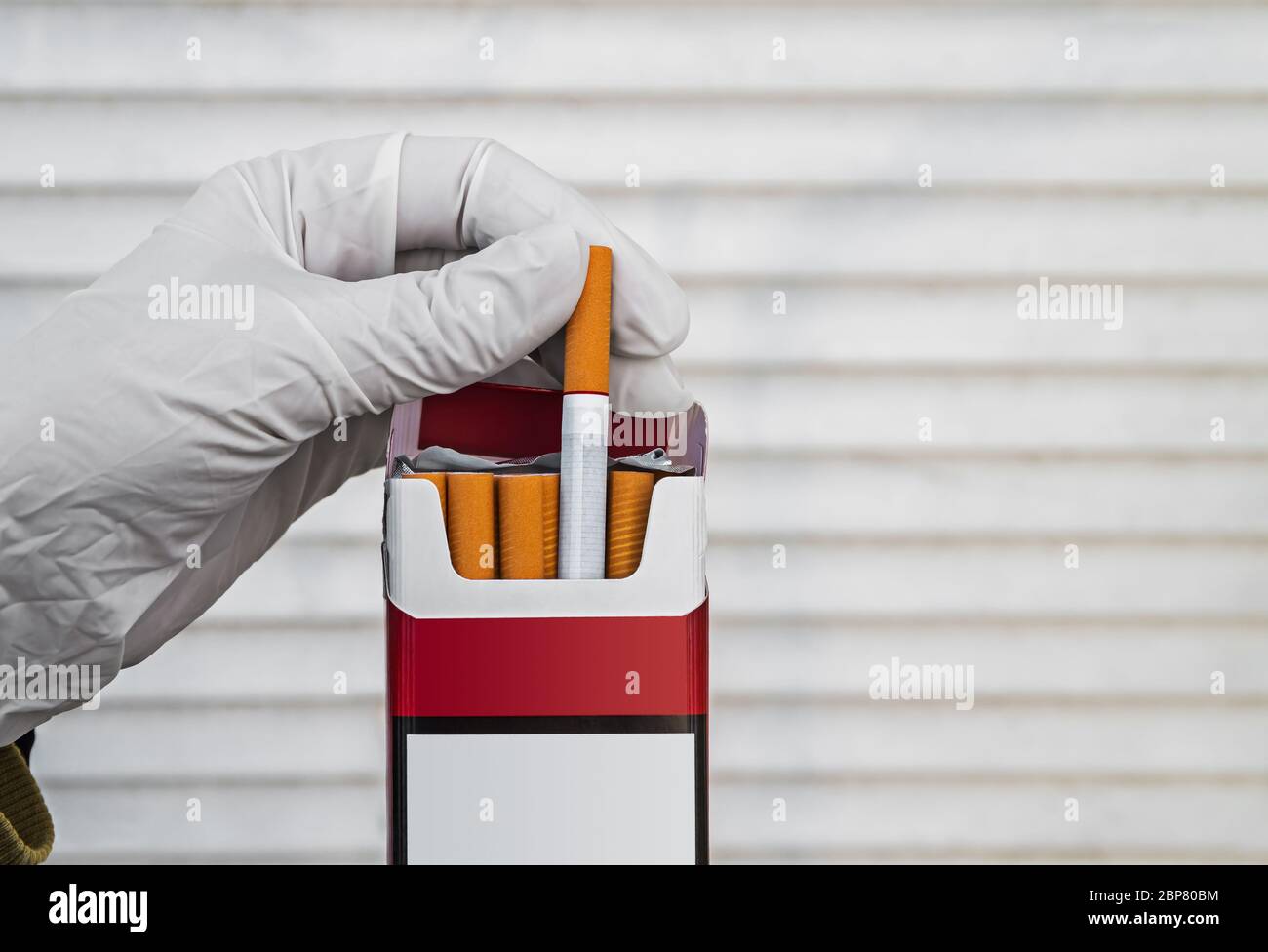 Example of dangerously packaged cigarettes that can smoker with a virus ...
