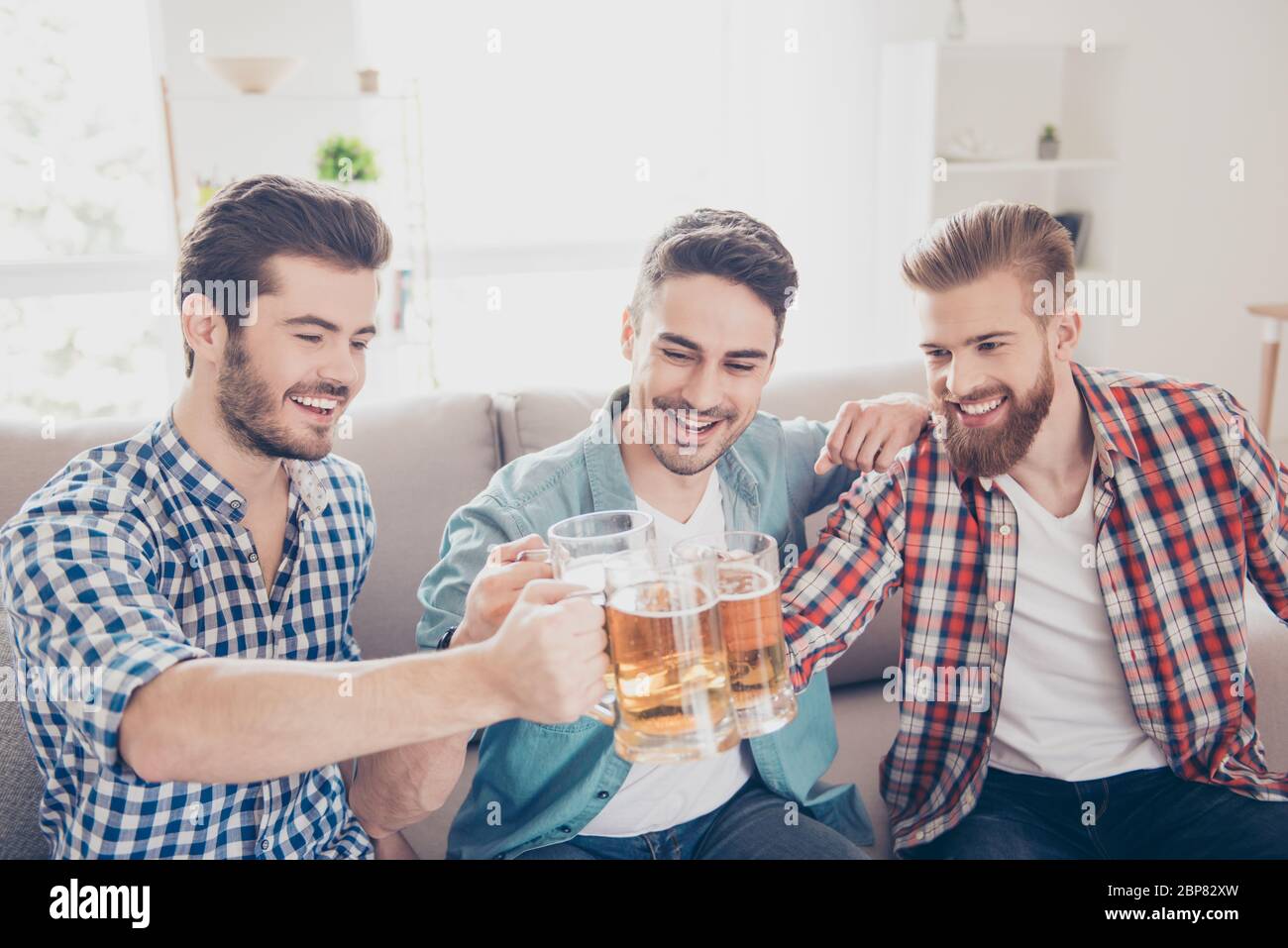 Bachelor men`s life. Close up portrait of three happy men friends ...