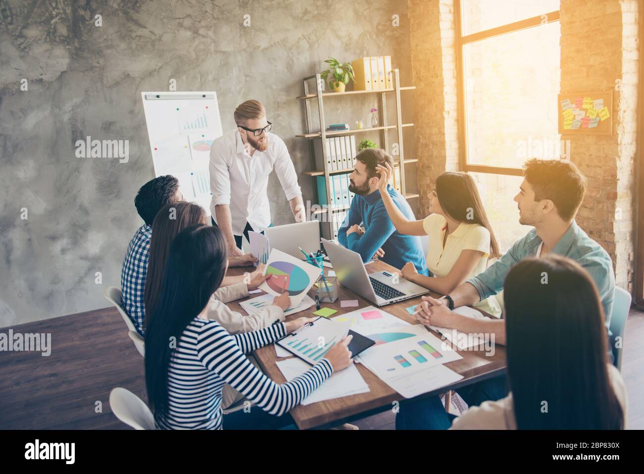 Hot discussion in the meeting. Serious business partners are using ...