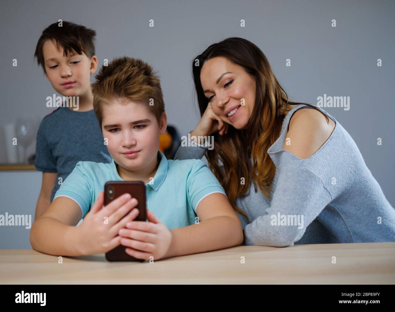 Happy family making a video call Stock Photo - Alamy