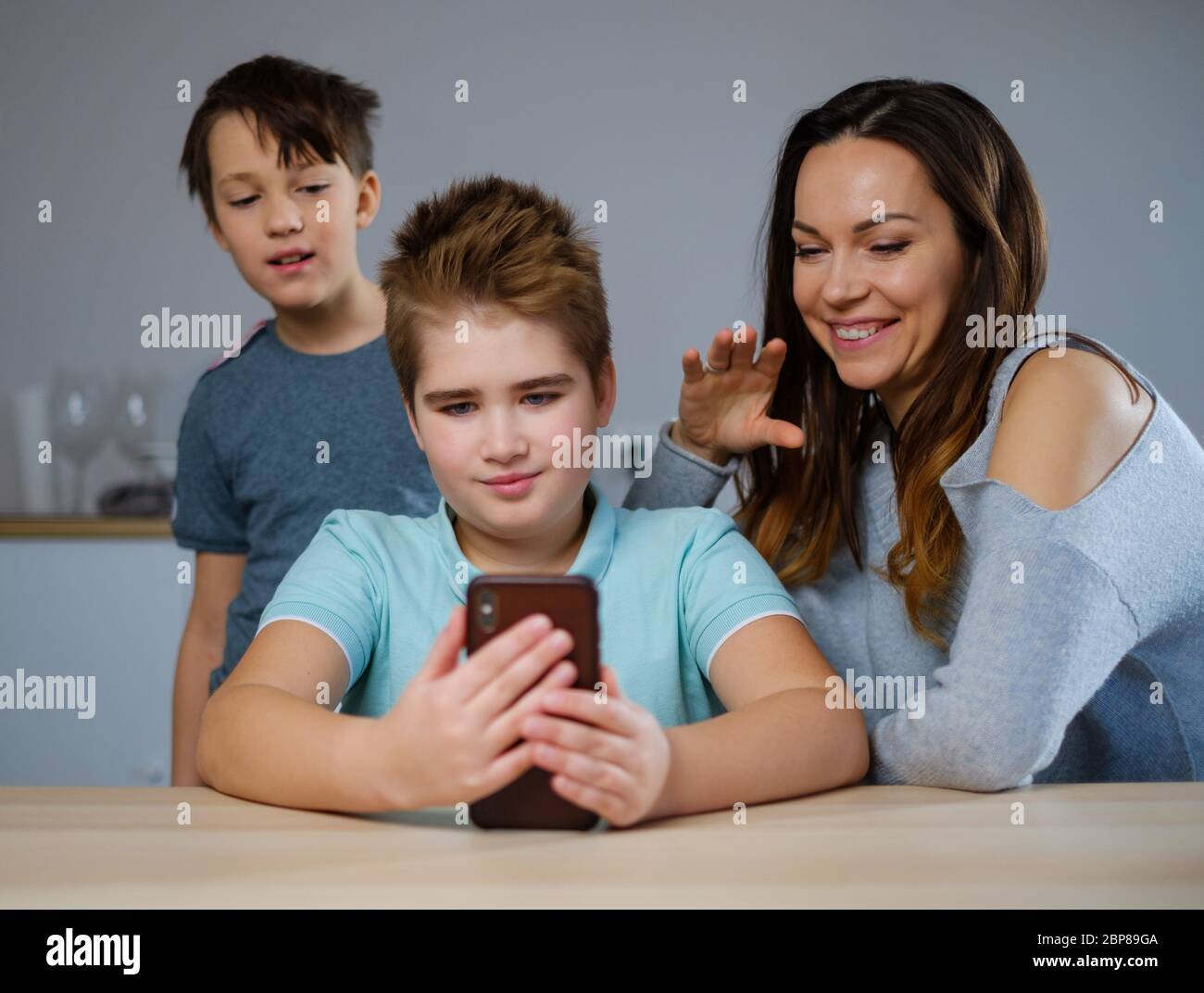 Happy family making a video call Stock Photo - Alamy