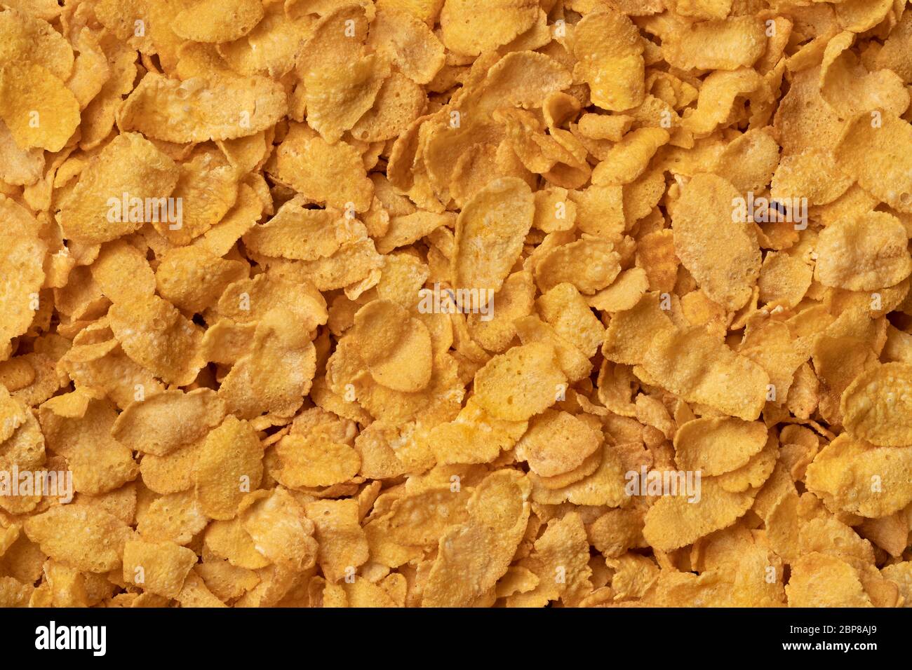 Traditional cornflakes close up full frame Stock Photo - Alamy