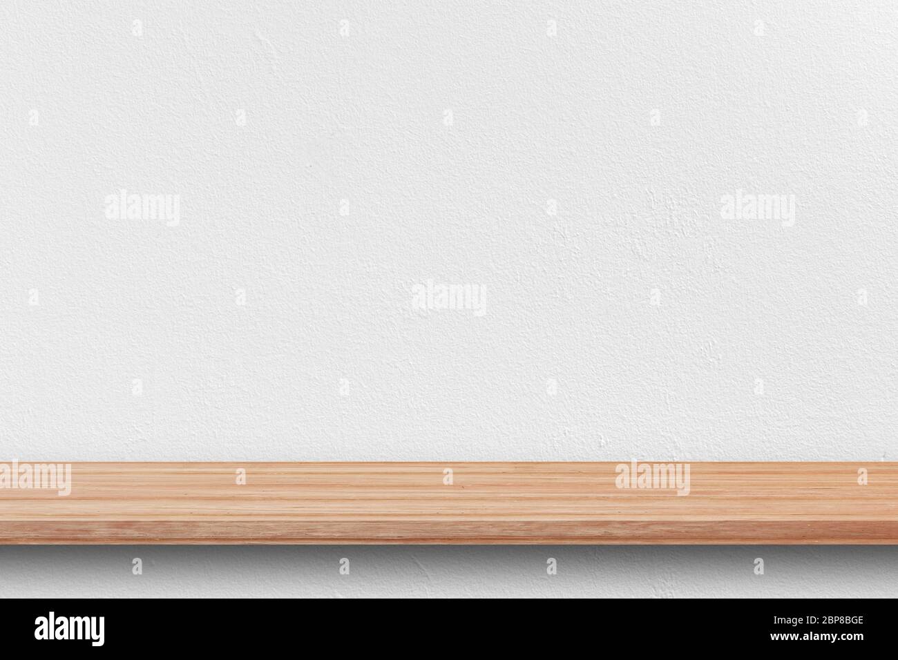 Front view of empty bookshelf and grey wall for product display or ...