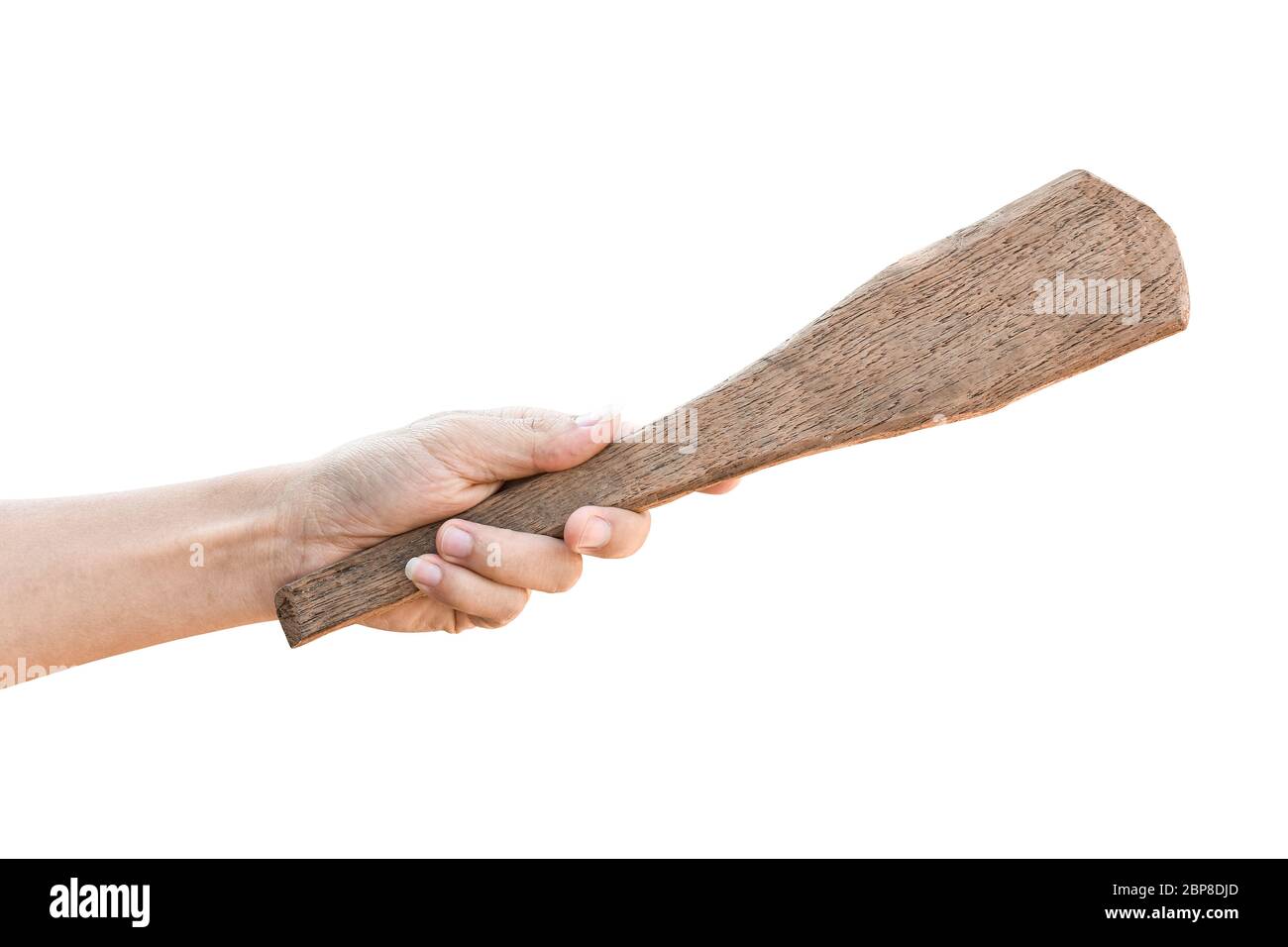 Hand holding old wooden ladle, Isolated on white background with ...