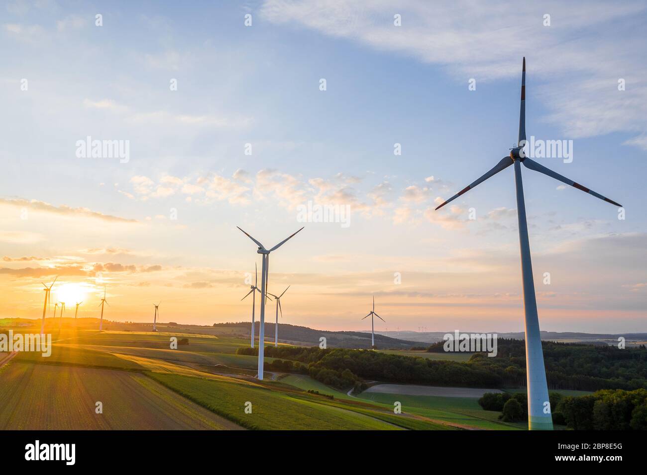 Evening sun and wind wheel hi-res stock photography and images - Alamy