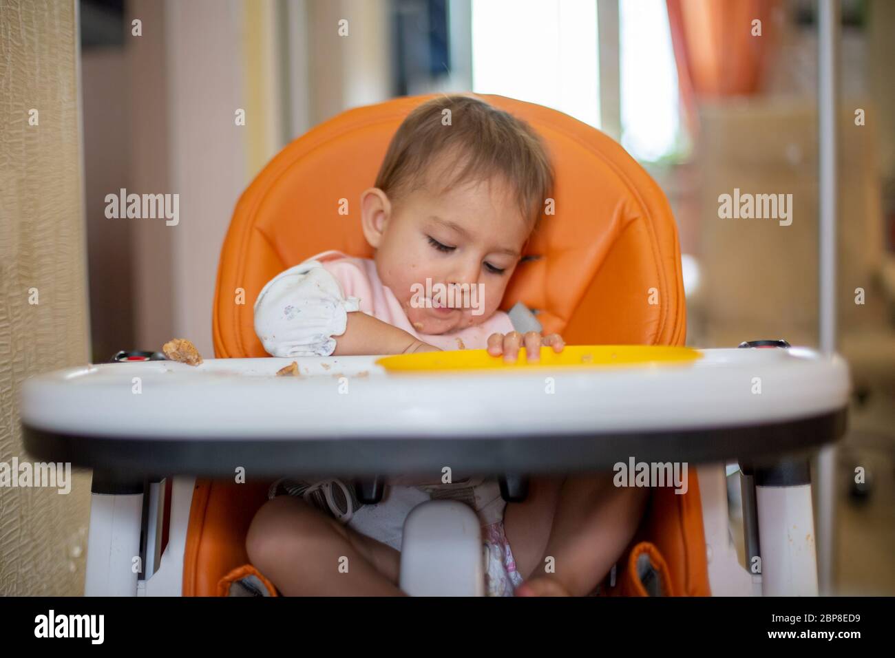 Dirty kid sits table hi-res stock photography and images - Alamy