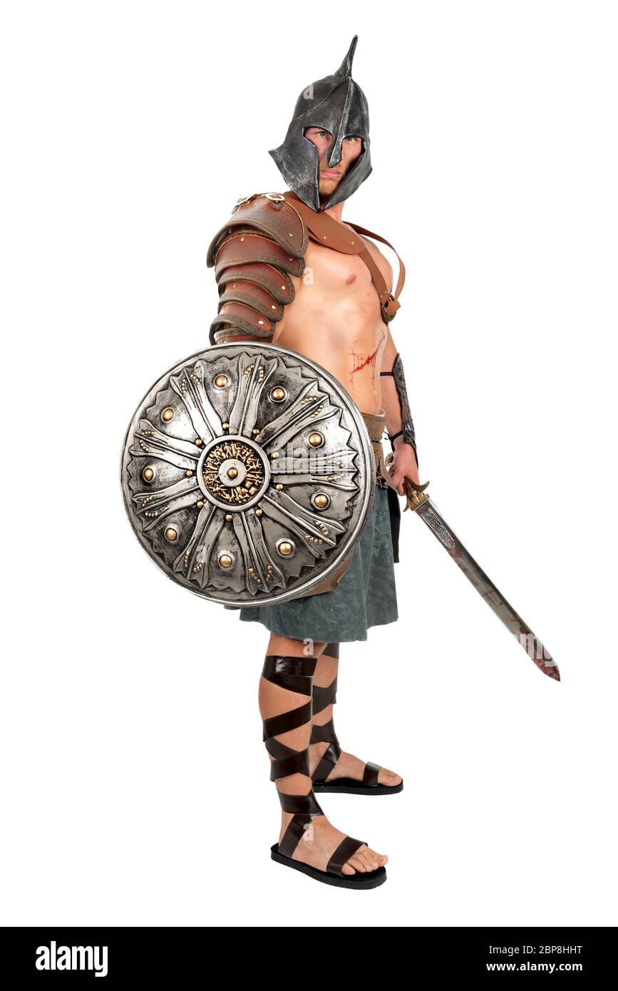 Gladiator posing isolated in a white background Stock Photo - Alamy