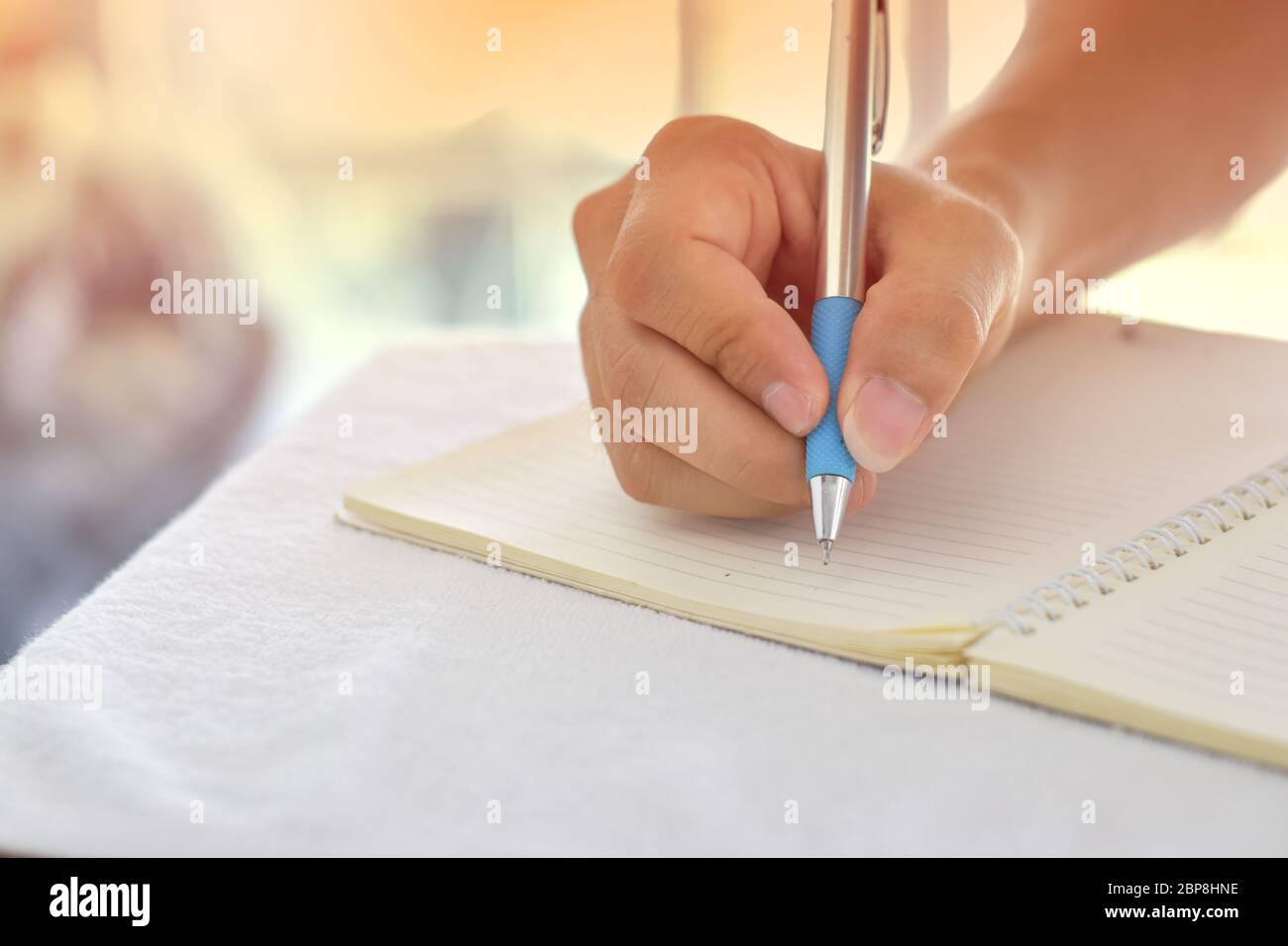 Hand writing with a pen book hi-res stock photography and images - Alamy