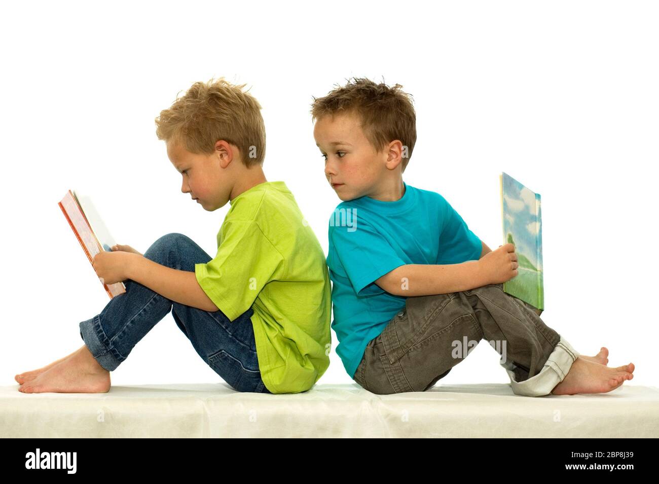 Surprised boy reading book hi-res stock photography and images - Alamy