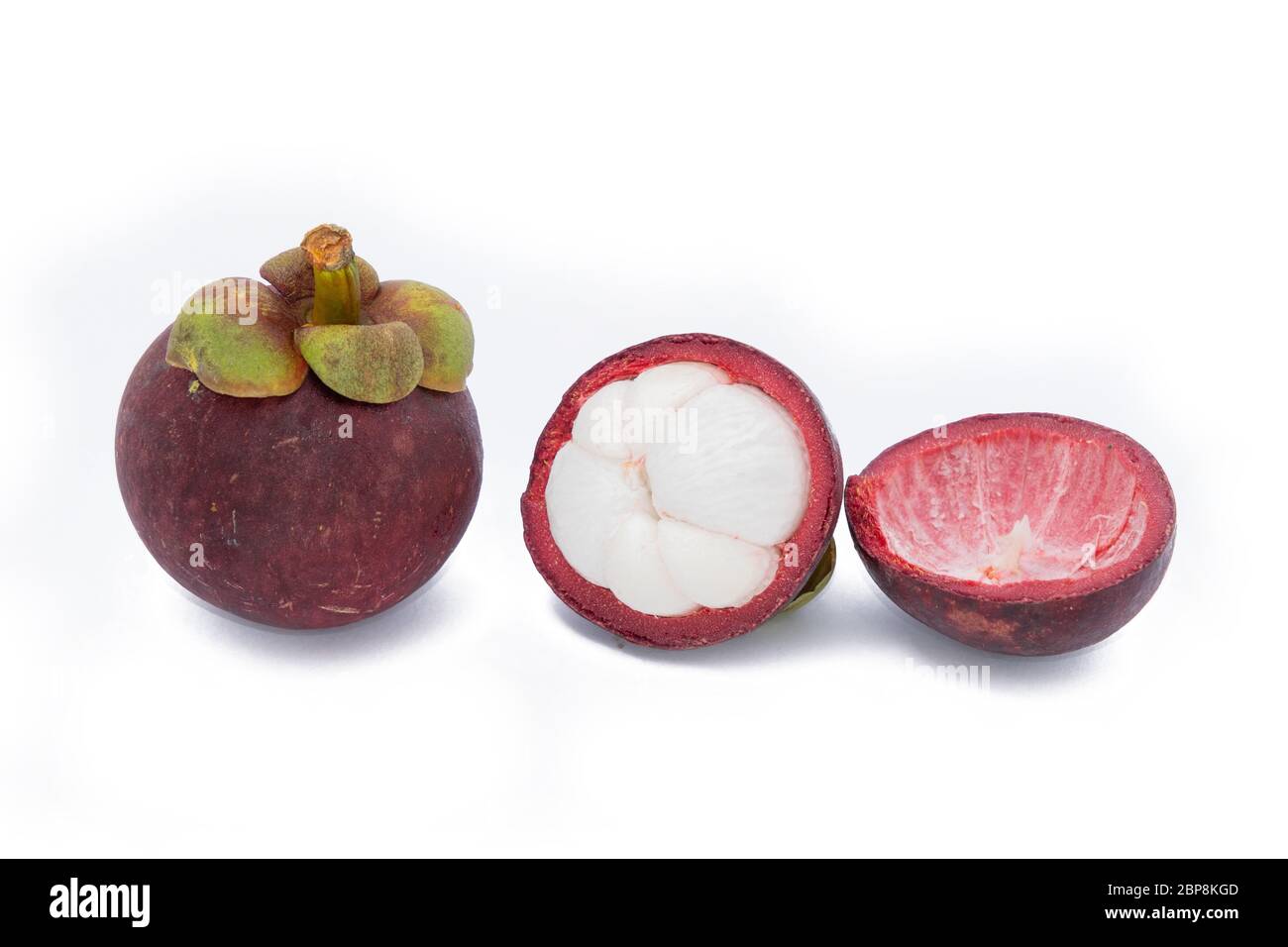 The Mangosteen and cross section showing the thick purple skin and ...