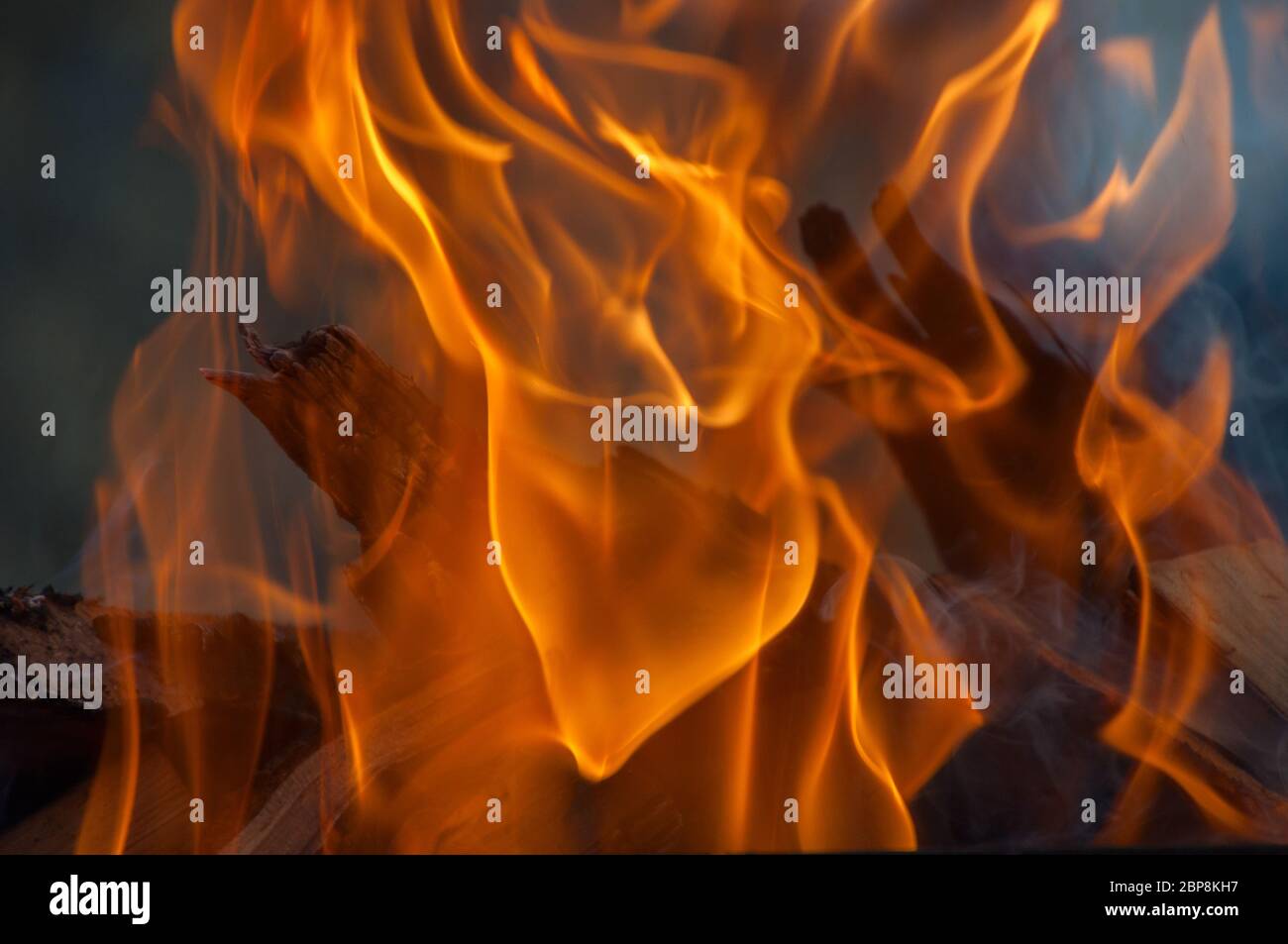 burning fire in a brick fireplace close up, close up Stock Photo - Alamy