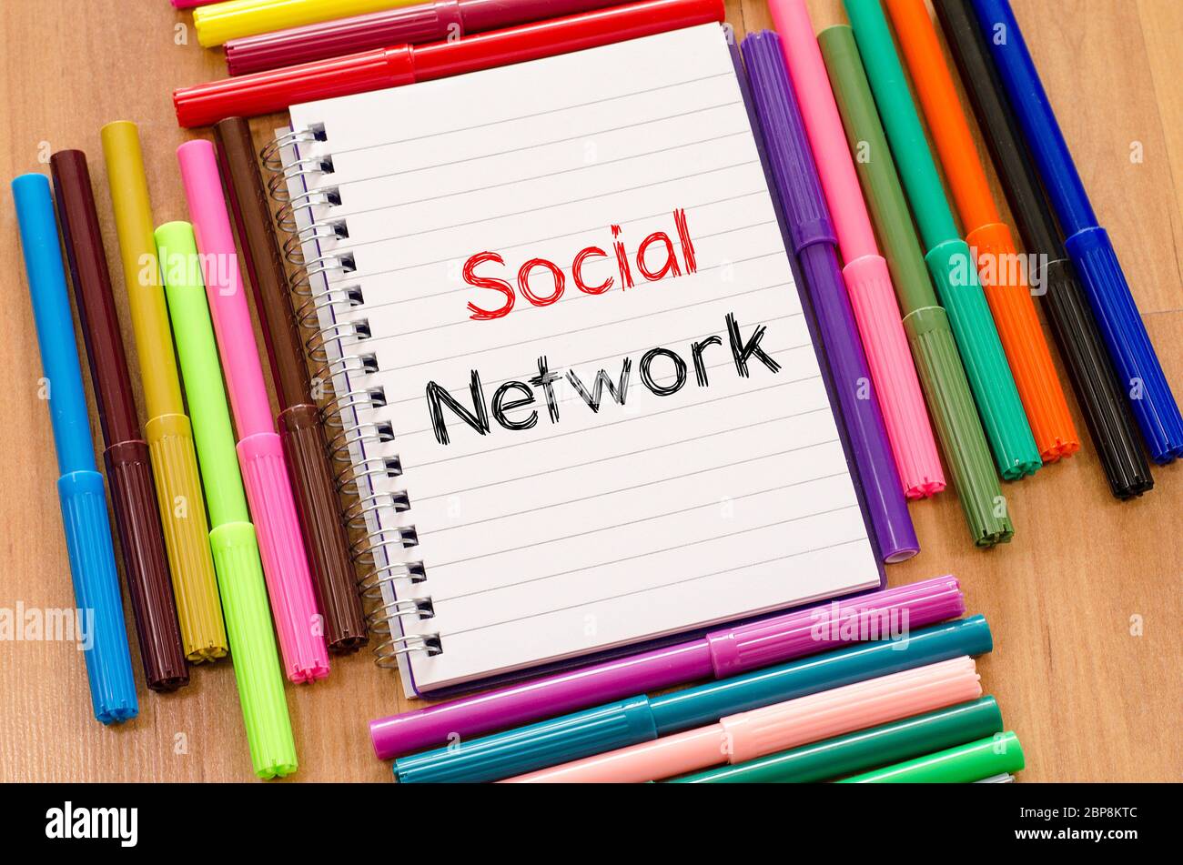 Felt-tip pen and notepad on a wooden background and text concept Stock ...