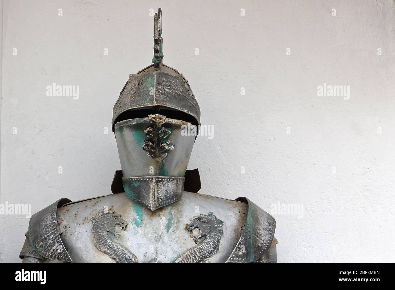 Medieval metal armor and helmet headdress on white background Stock ...