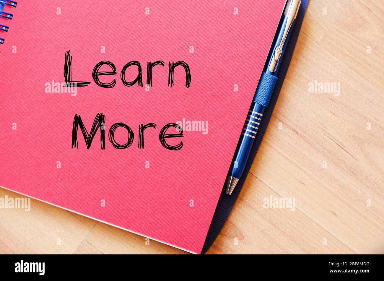 Learn more text concept write on notebook Stock Photo - Alamy