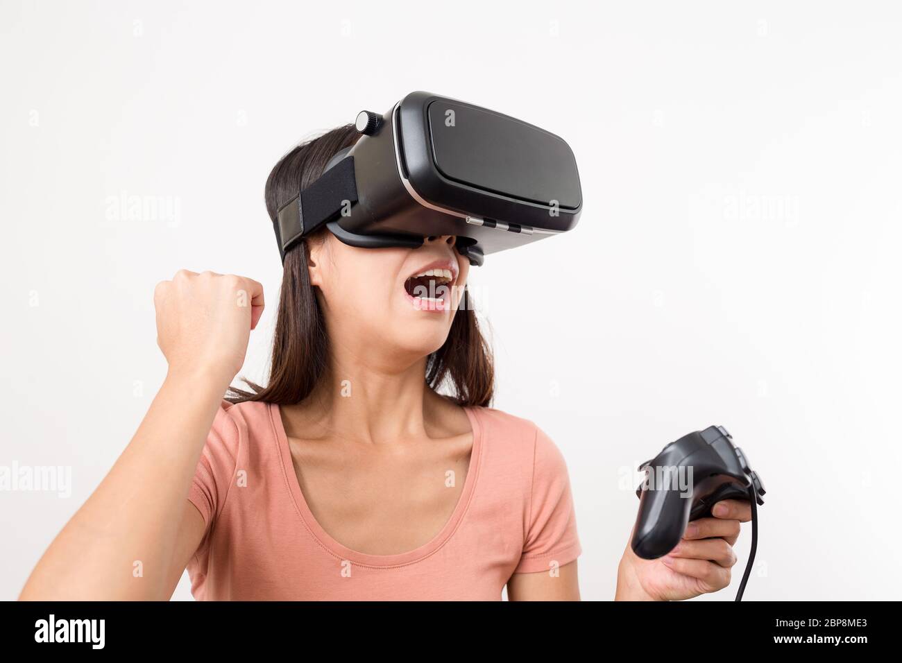 Woman play game with VR device Stock Photo - Alamy