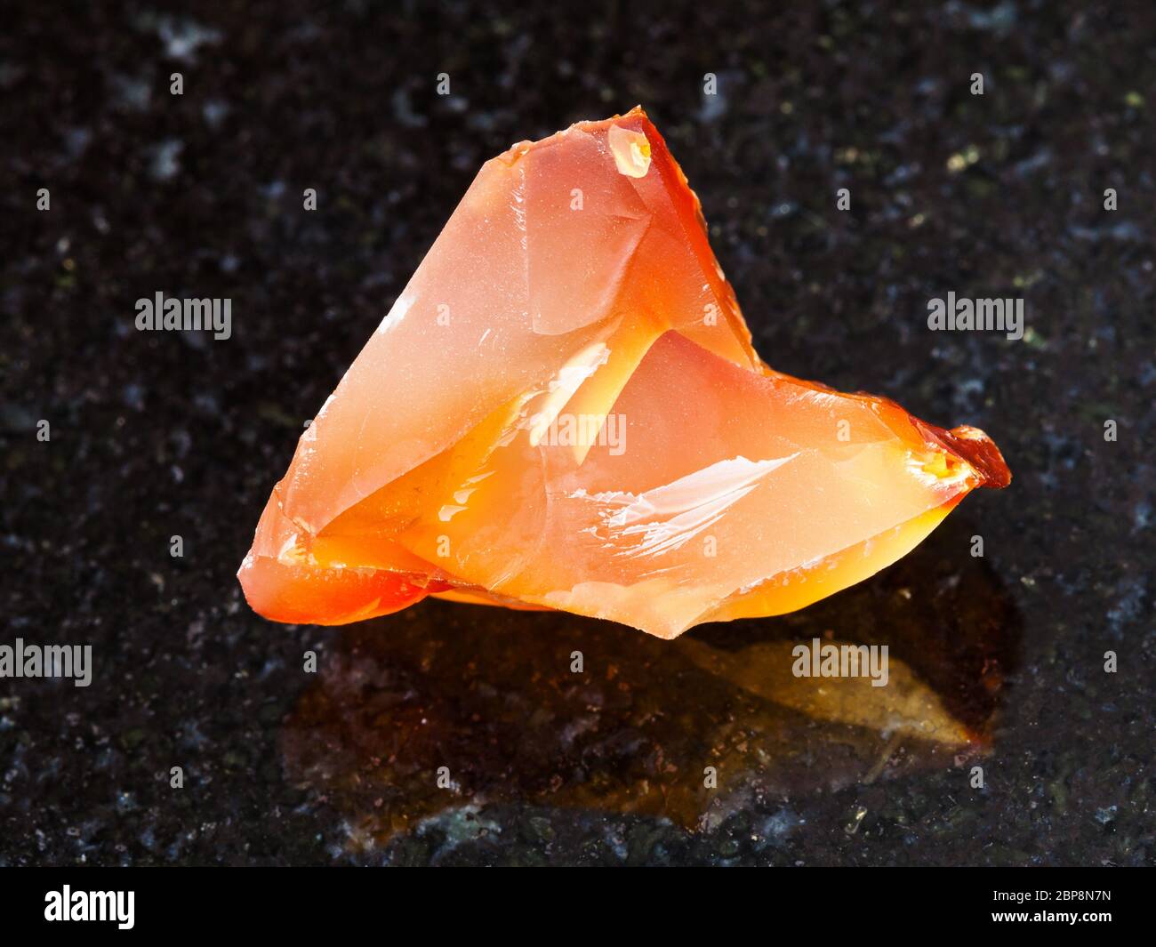 macro shooting of natural mineral rock specimen - crystal of cornelian ...