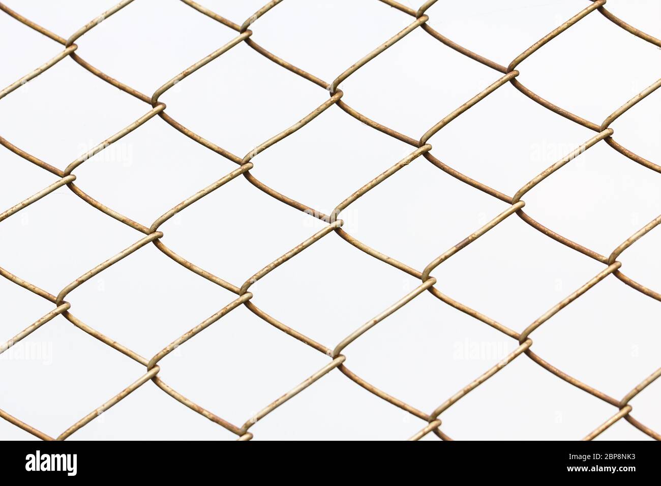 Old chain link fence with white background Stock Photo - Alamy