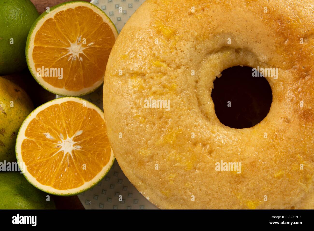 homemade orange cake in round shape with hole Stock Photo - Alamy