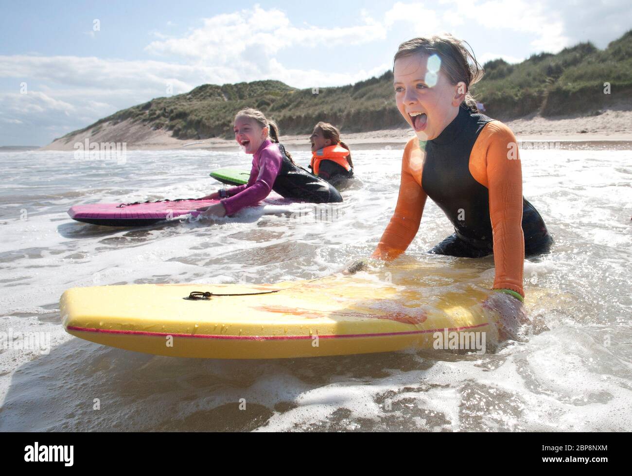Bodyboarding wetsuits hi-res stock photography and images - Alamy