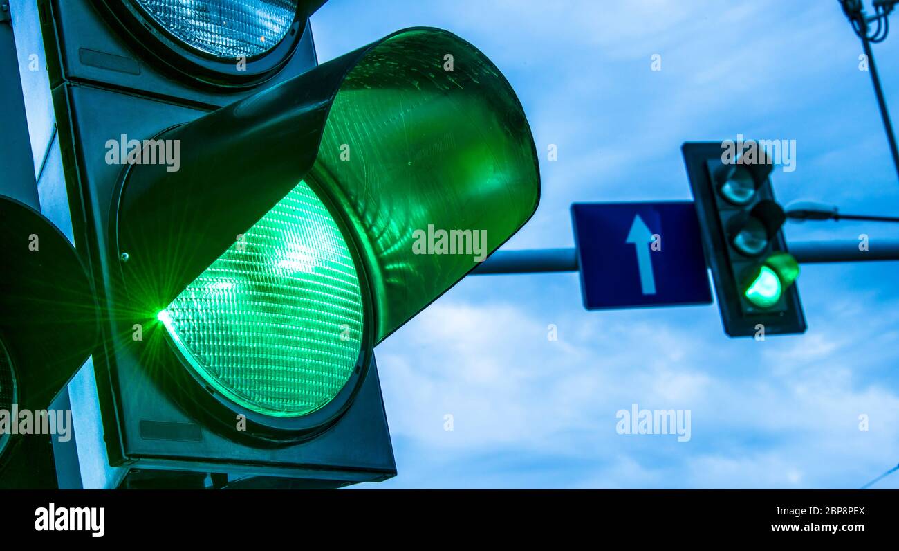 Traffic lights over urban intersection Stock Photo - Alamy