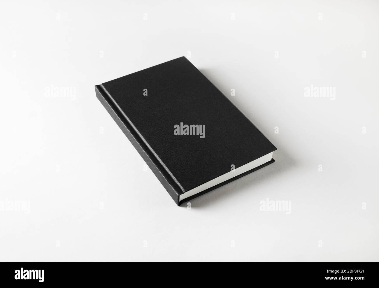 Blank black book cover on white paper background Stock Photo - Alamy
