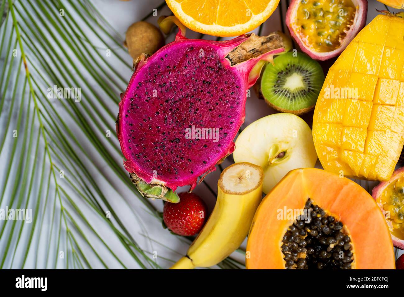 Set of exotic tropical fruits. Papaya, mango, dragon fruit, passion ...