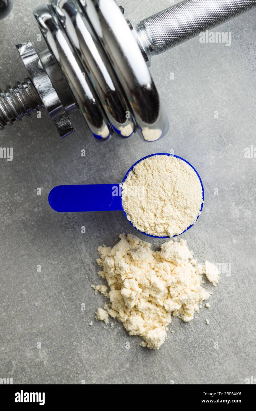 Whey protein powder in scoop. Top view Stock Photo - Alamy