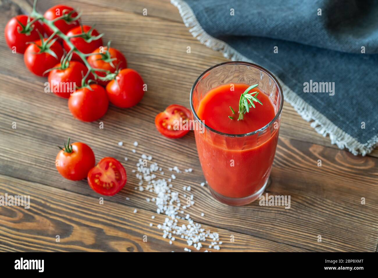 A glass of tomato juice with cherry tomatoes Stock Photo - Alamy