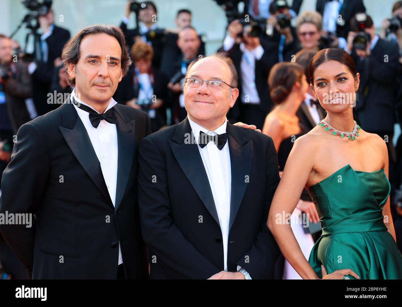 VENICE, ITALY - AUGUST 27: Jhumpa Lahiri, Alexandre Desplat and Carlo ...