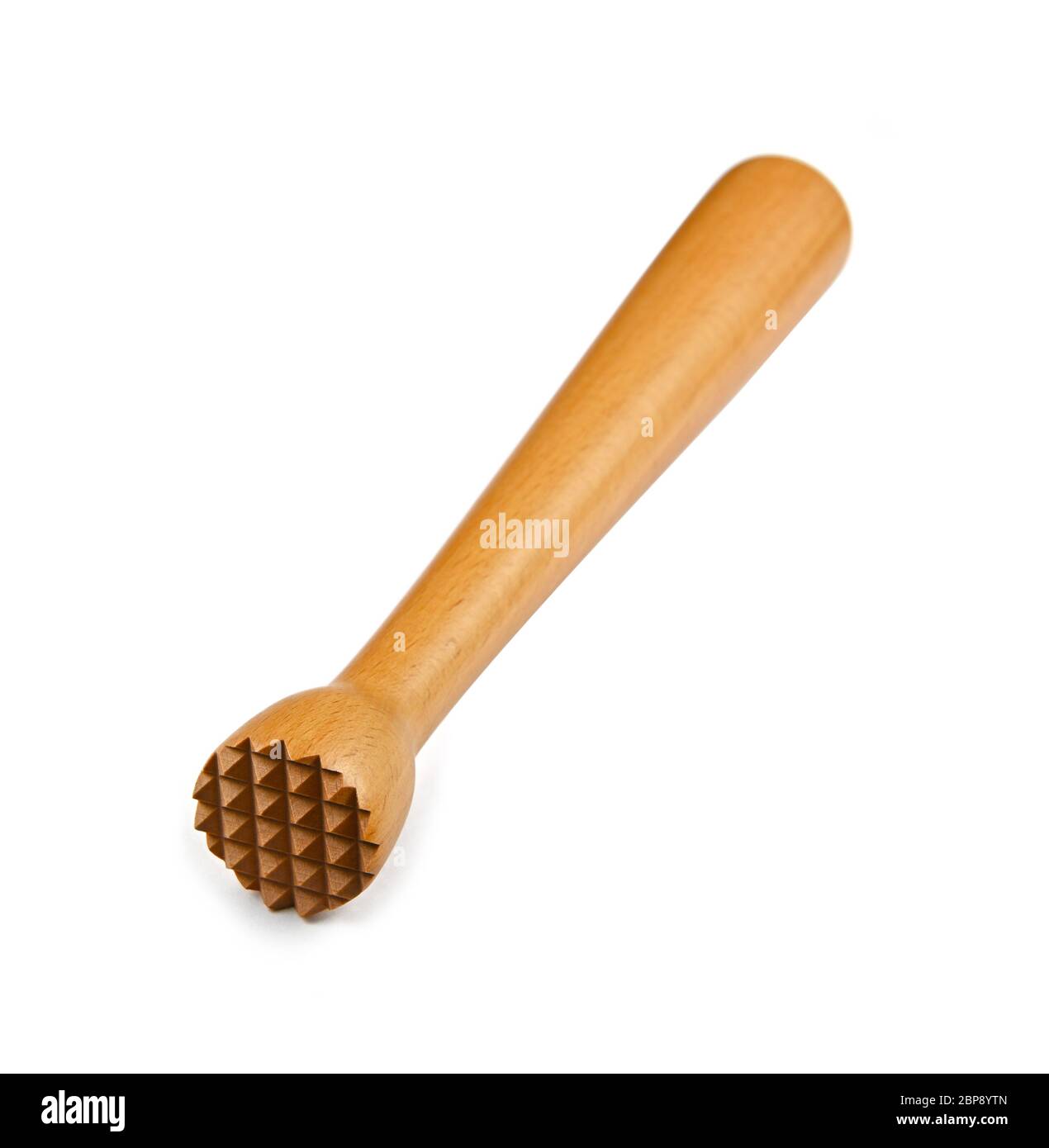 Close up traditional brown wooden muddler to mash fruits for mojito ...