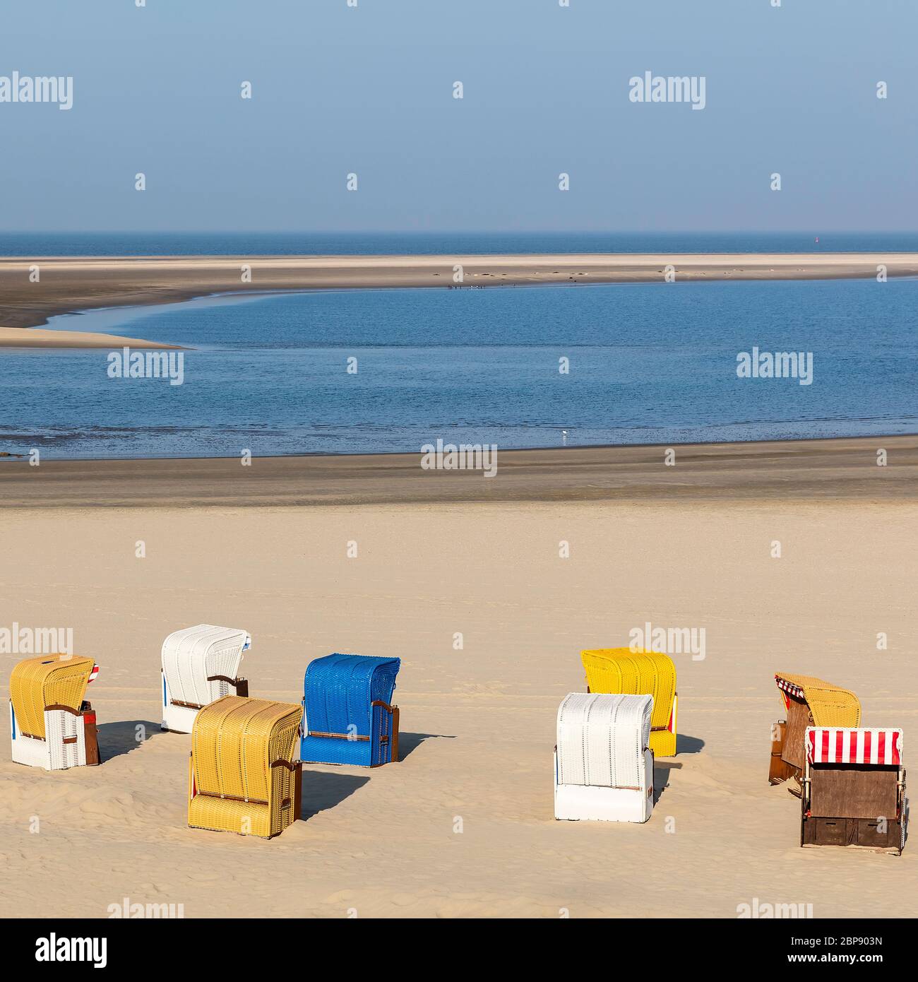 Relaxation on the beach in a beach chair Stock Photo - Alamy