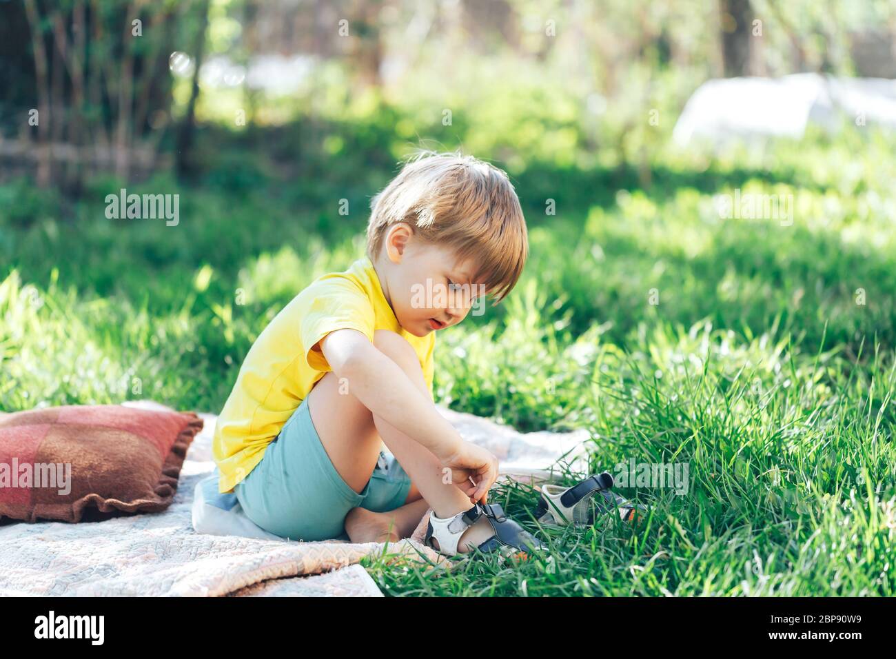 Takes off his shoes hi-res stock photography and images - Alamy